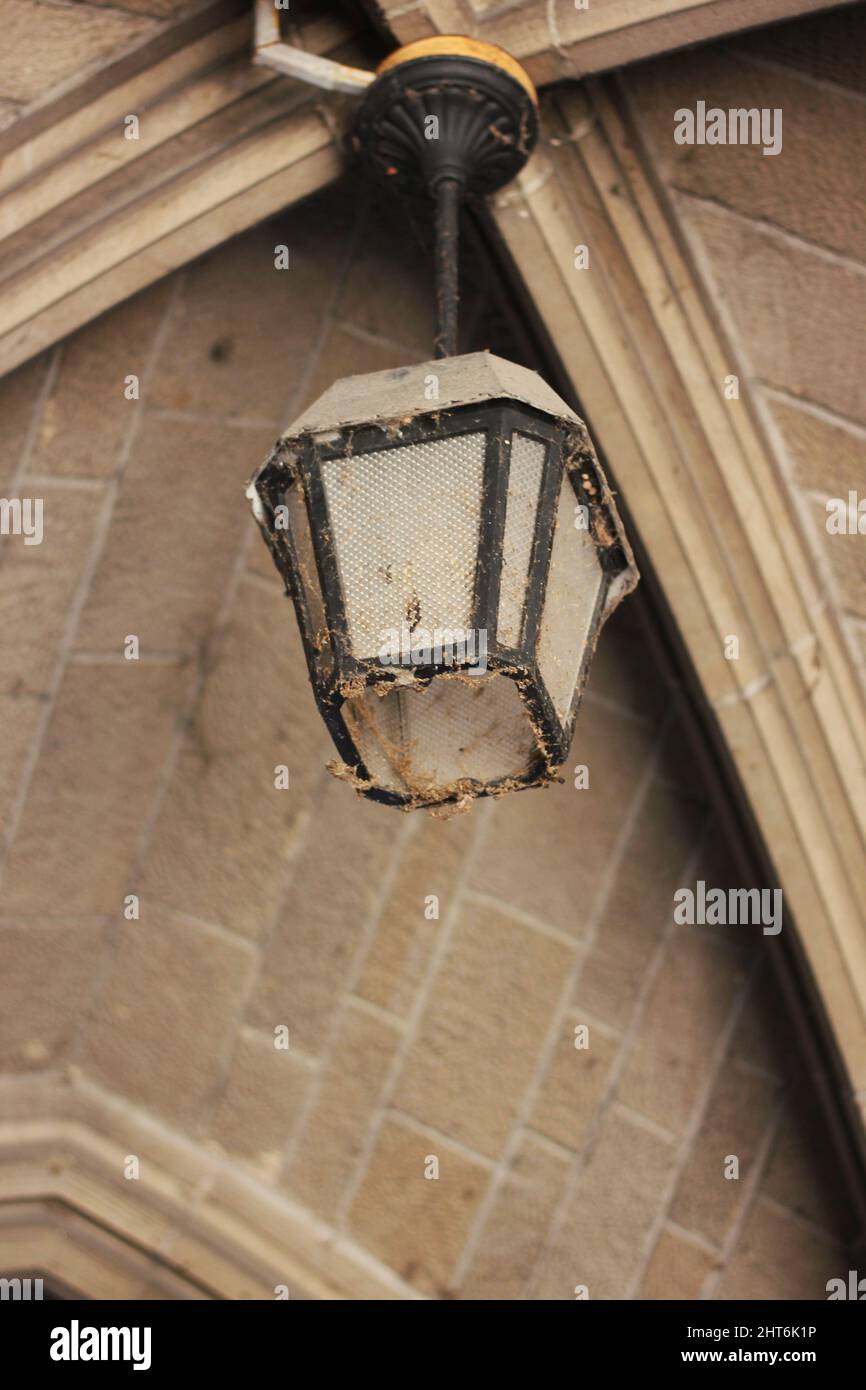 Ancient Gothic medieval lantern hanging from the elaborate ceiling ...