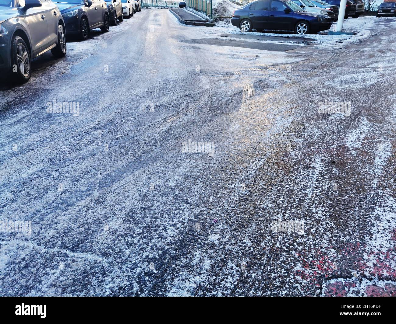 asphalt road covered with ice, slippery road winter Stock Photo - Alamy