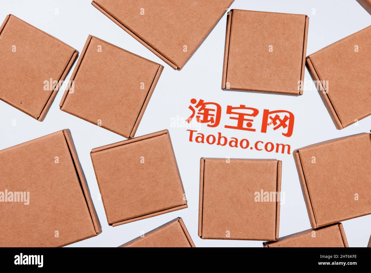 Taobao is a Chinese online shopping platform. Taobao logo on a white ...