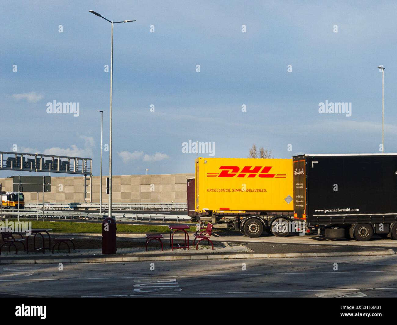Yellow trailer of the German parcel service DHL Stock Photo - Alamy