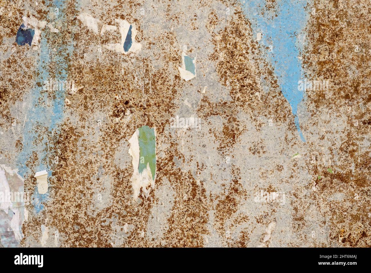 Old rusty metal billboard with torn paper Stock Photo - Alamy