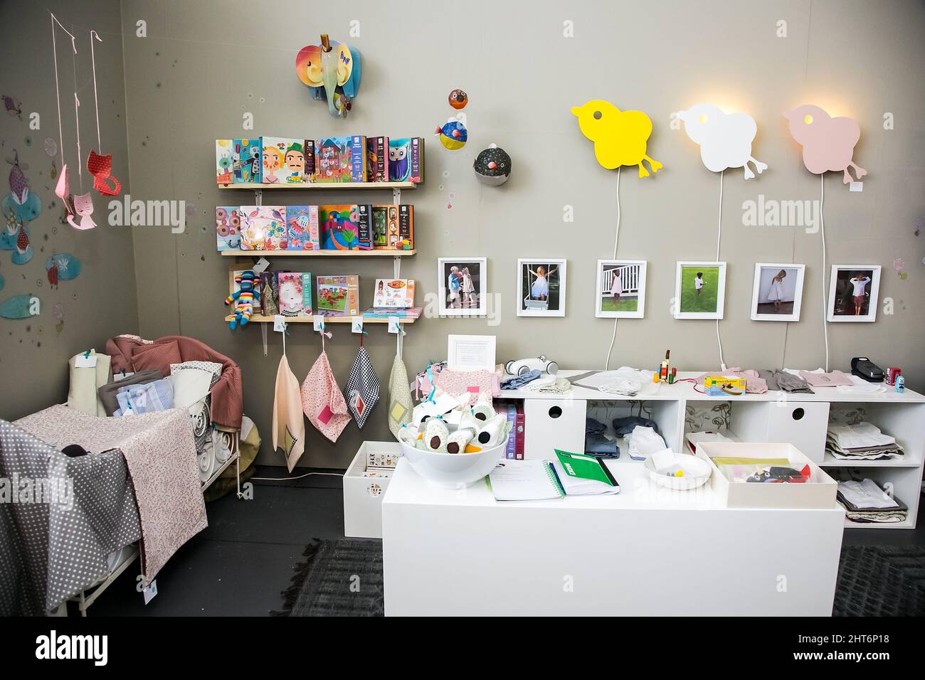 Items for kids on display at exhibitor stand at hand-made design fair ...