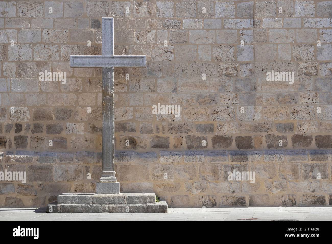 horizontal view of a large stone cross, symbol of catholic church, in ...