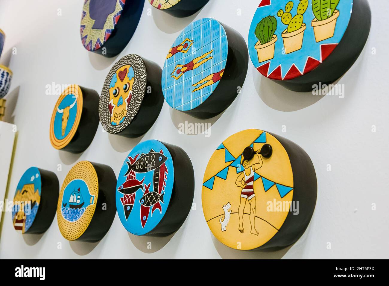 Creative items on display at exhibitor stand at hand-made design fair ...