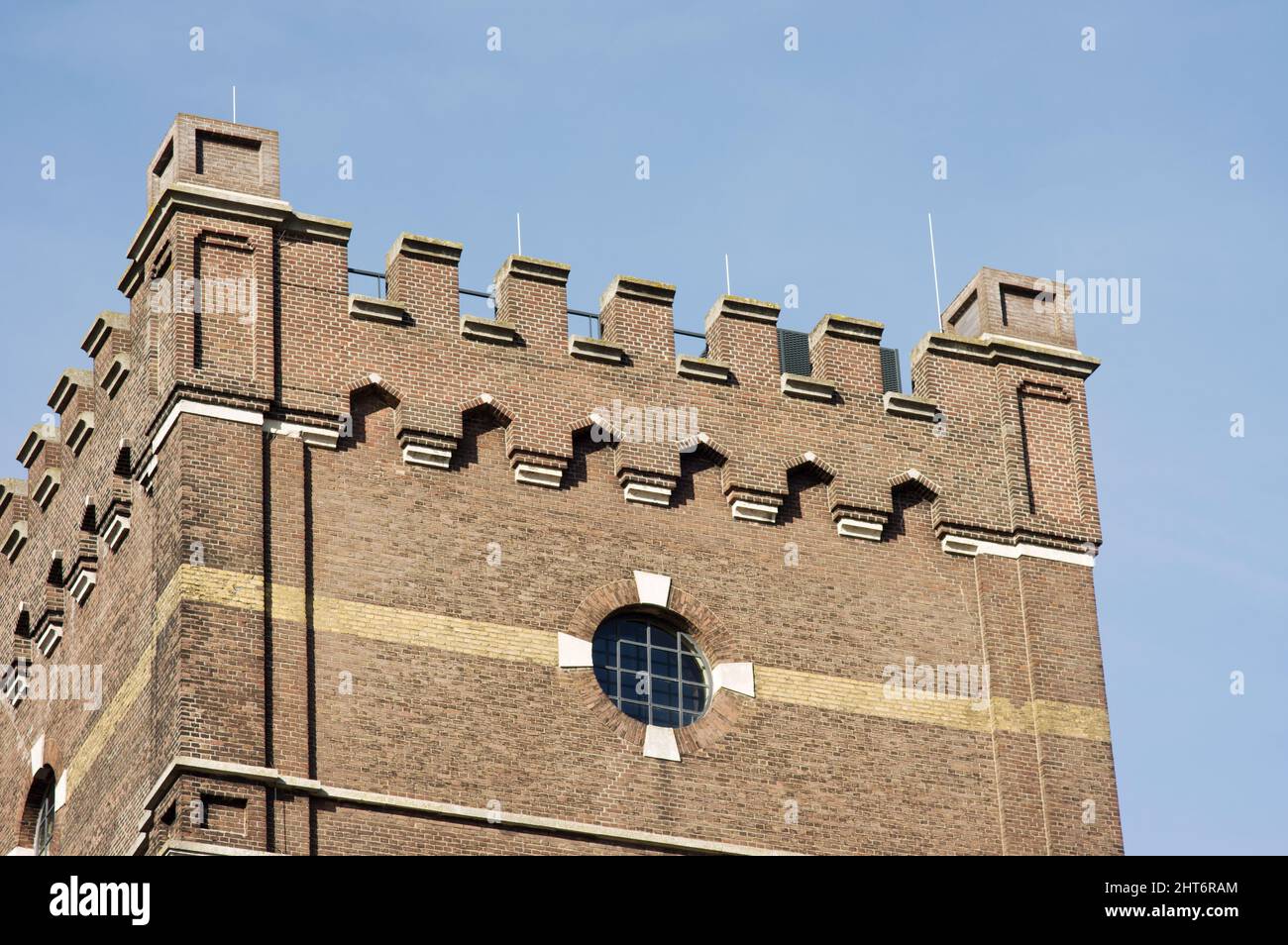 Top of modern tower with a medieval appearance in the center of Den ...