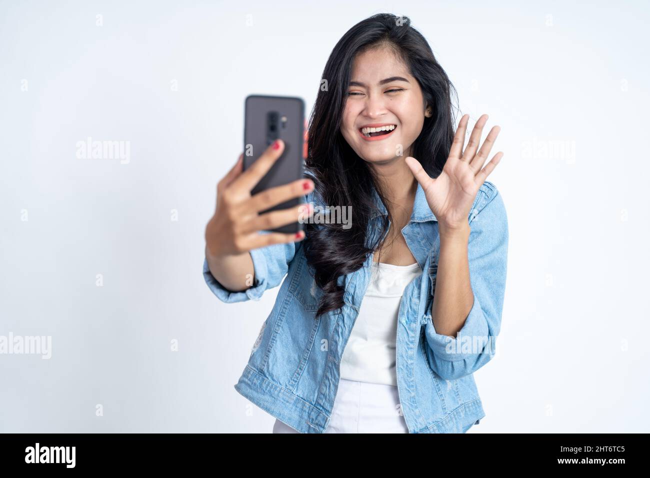 Attractive young woman saying hello hi-res stock photography and images ...