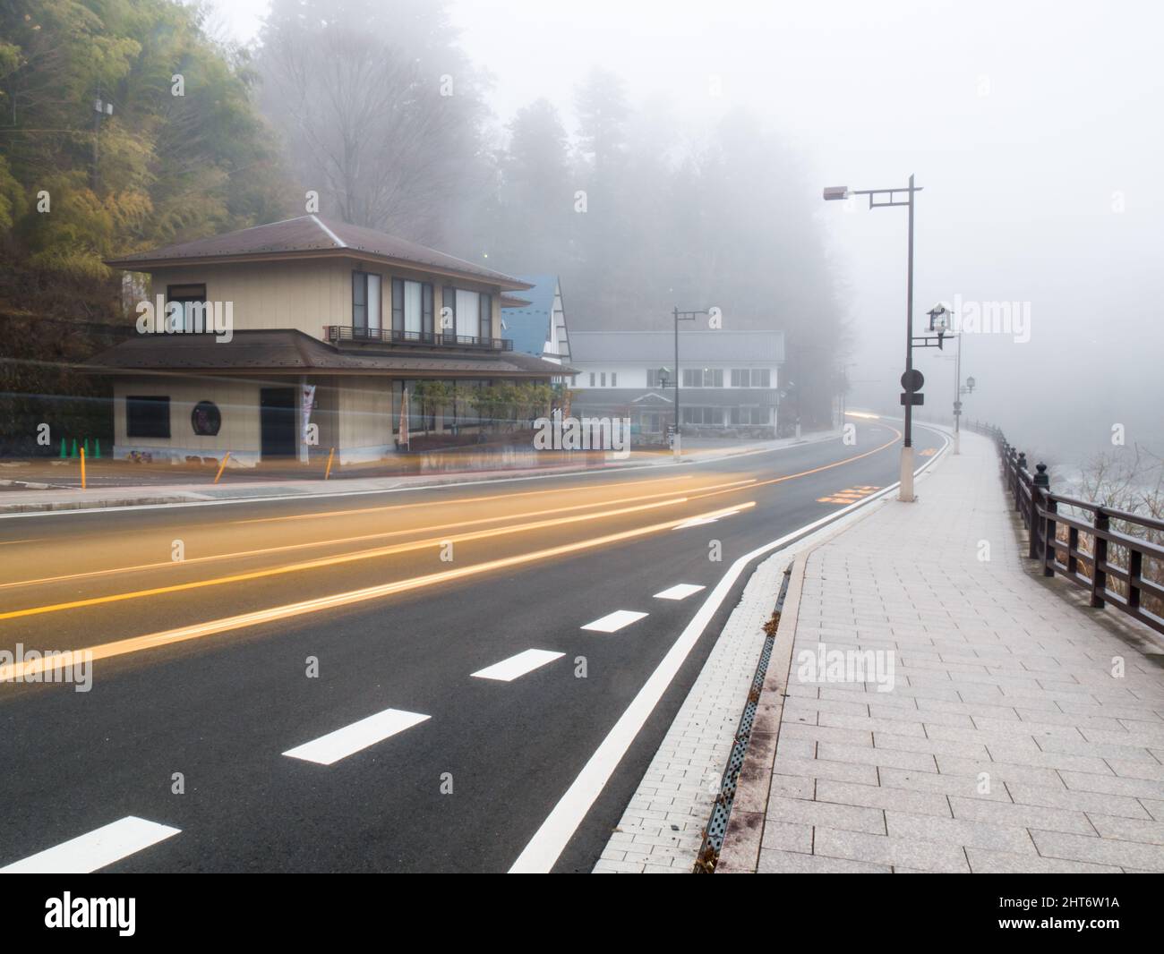Foggy and empty road in Nikko, Japan Stock Photo - Alamy