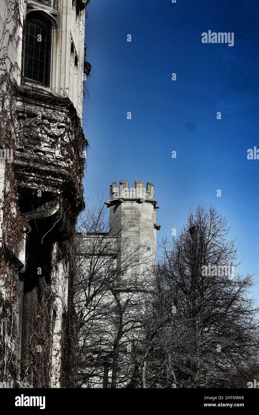 A forbidding medieval castle tower in the distance Stock Photo - Alamy