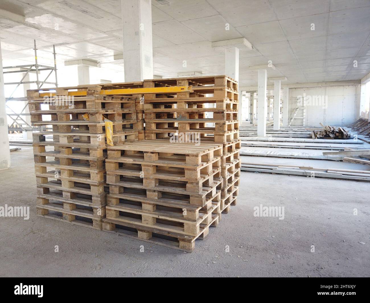 Wooden pallets at construction site Stock Photo - Alamy