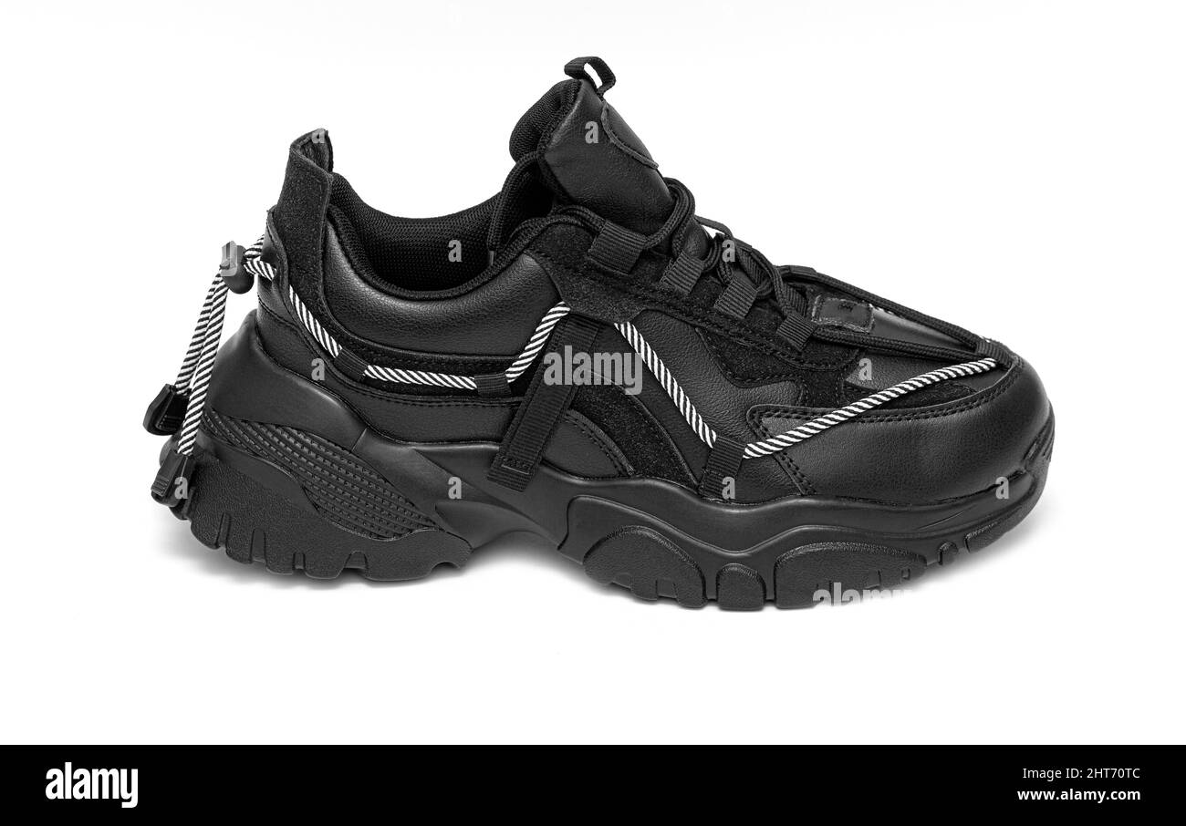 Side view of sneaker. Isolated in white background Stock Photo - Alamy