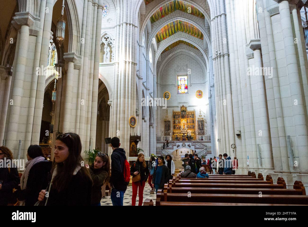 Madrid, Spain, Young Tourists Vistiting inside Spanish Catholic Church ...