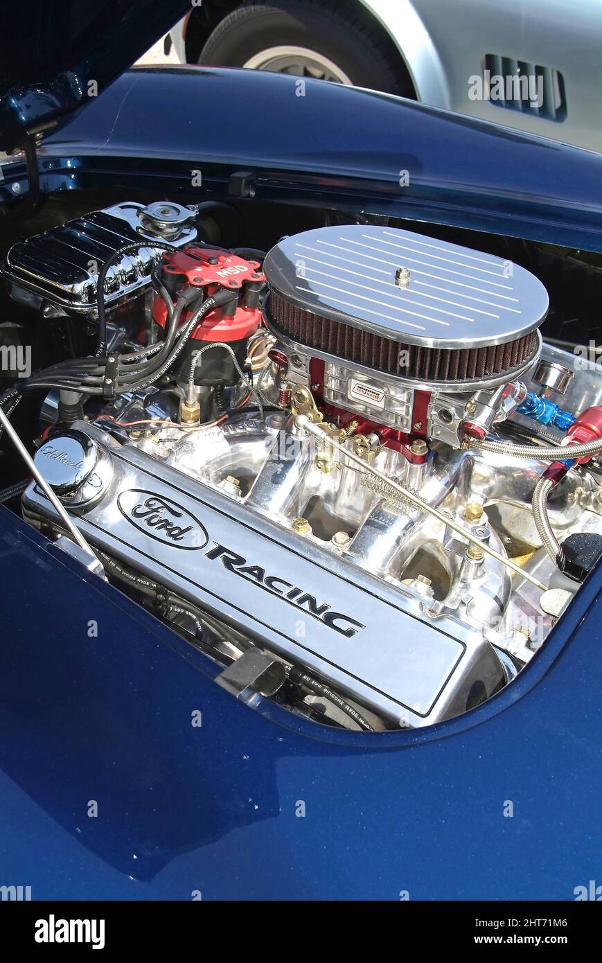 Closeup of the Ford engine in a classic AC Cobra high-performance car ...