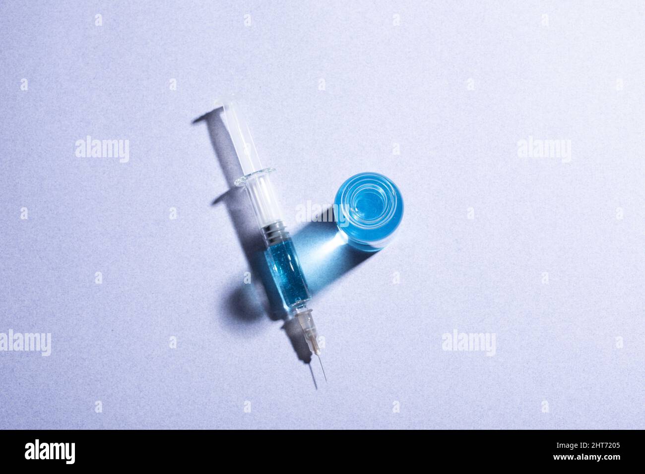 Closeup of a Syringe and Sterile Vial Filled with Medication Solution ...