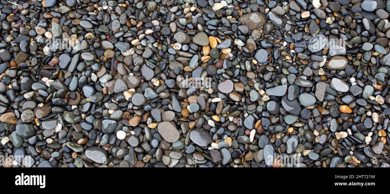 Smooth round pebbles texture background. Pebble sea beach close-up ...