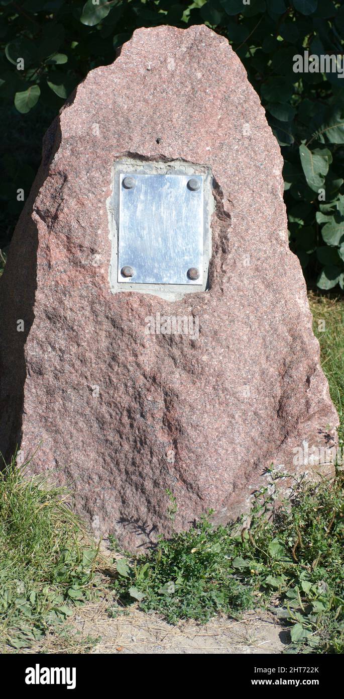 metal plate on granite stone in park at dry sunny summer day Stock ...