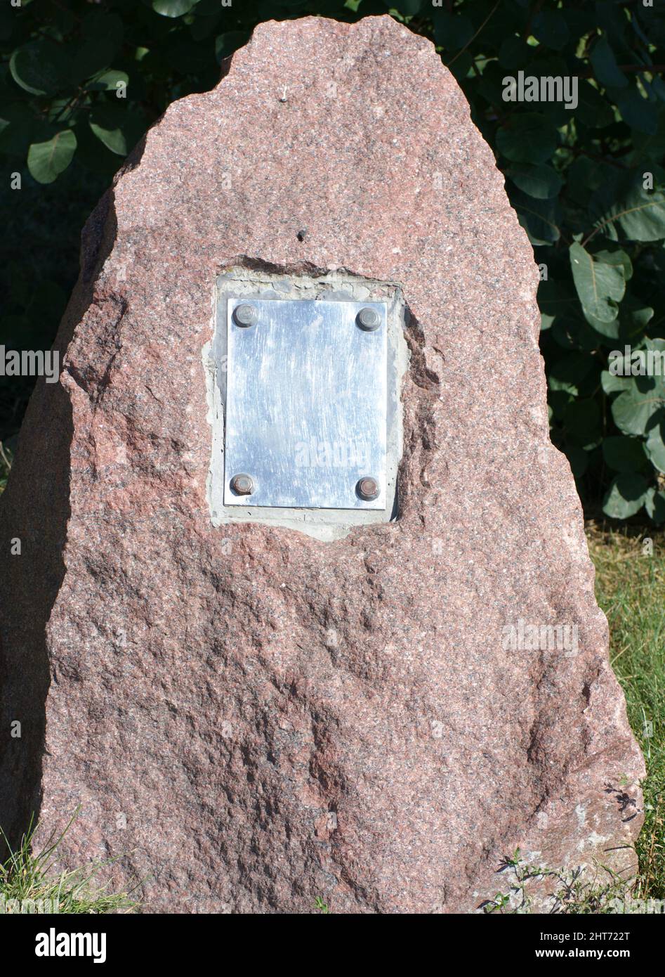 metal plate on granite stone in park at dry sunny summer day Stock ...