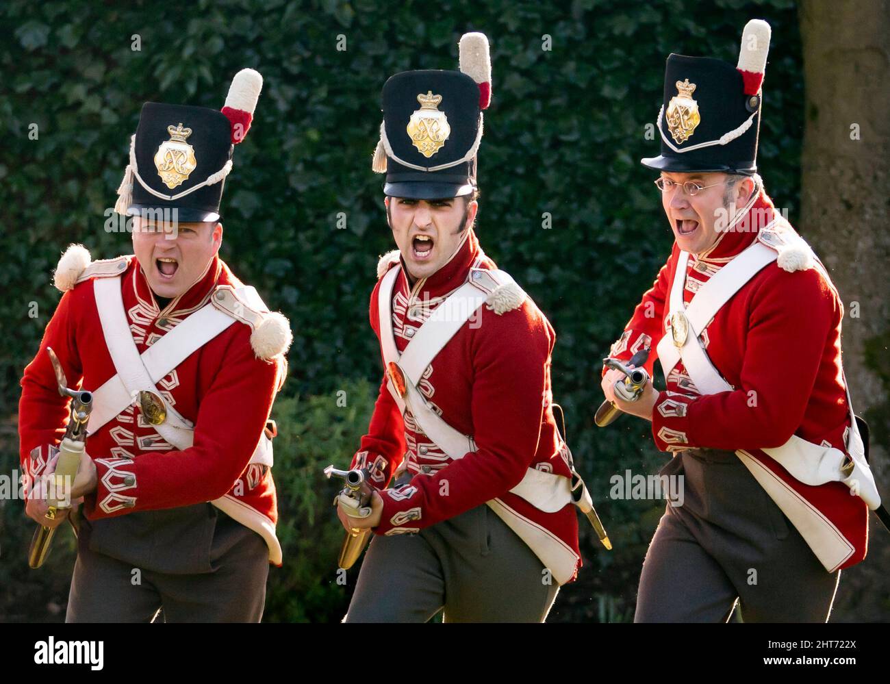 Members of the His Majesty's 33rd Regiment of Foot military reenactment ...