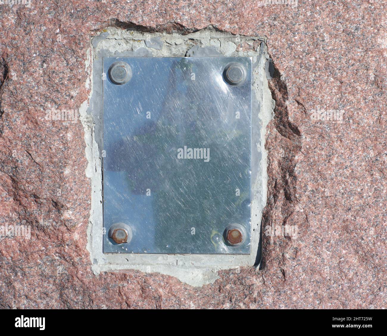 metal plate on granite stone in park at dry sunny summer day Stock ...