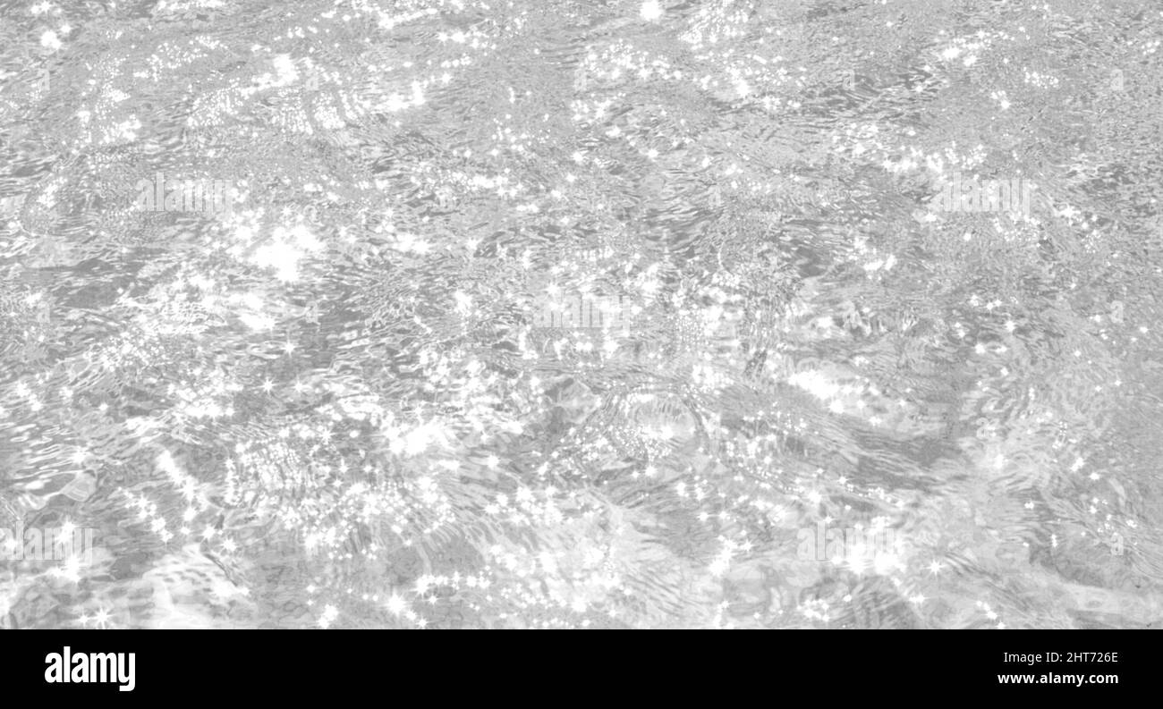 Closeup of desaturated transparent clear calm water surface texture ...