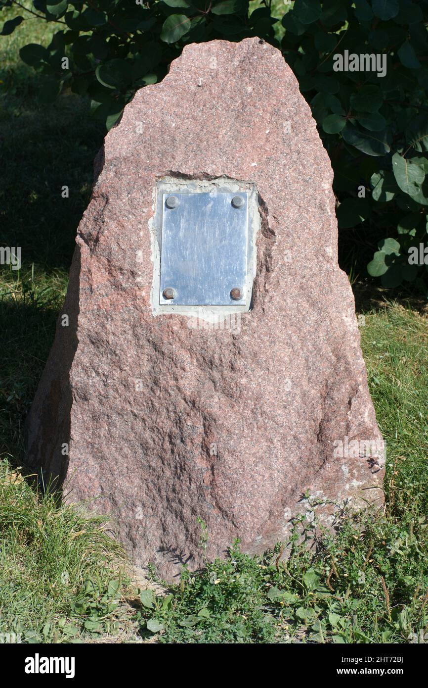 metal plate on granite stone in park at dry sunny summer day Stock ...