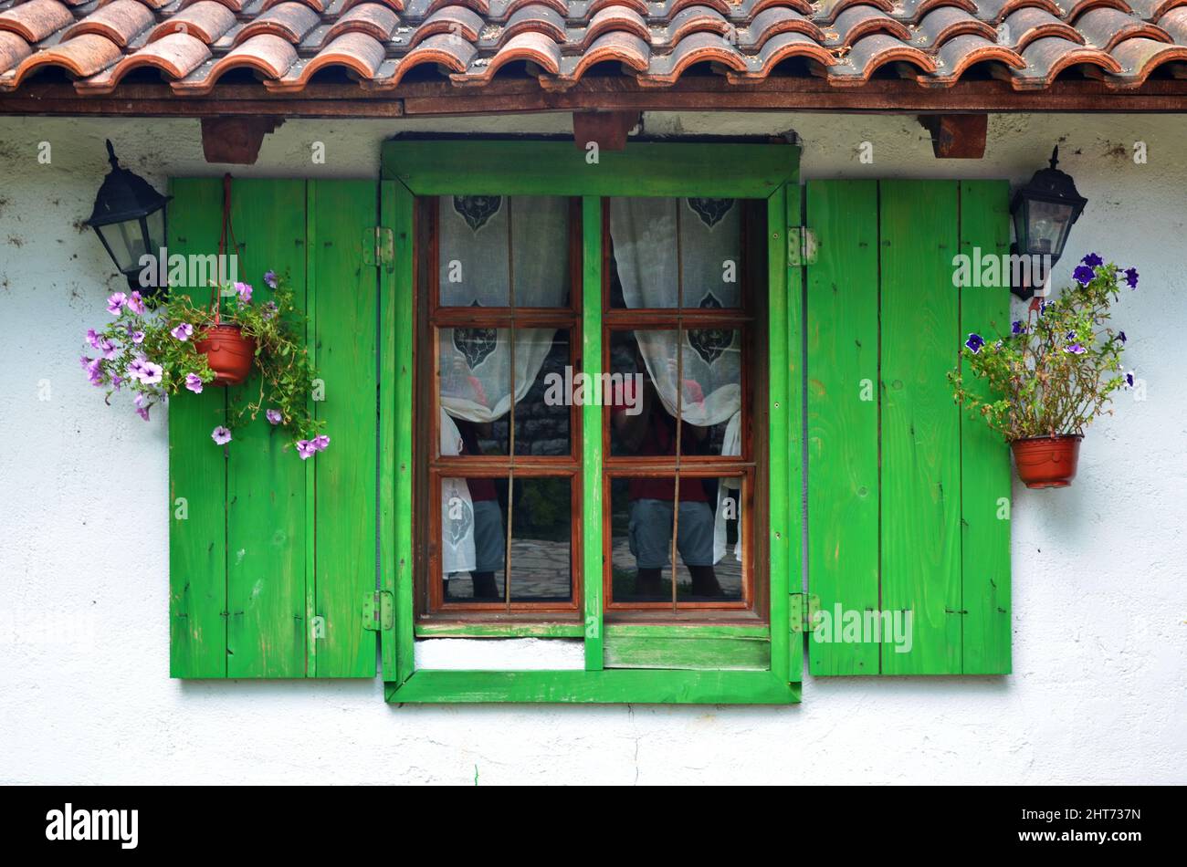 Beautiful green window in a rustic house Stock Photo - Alamy