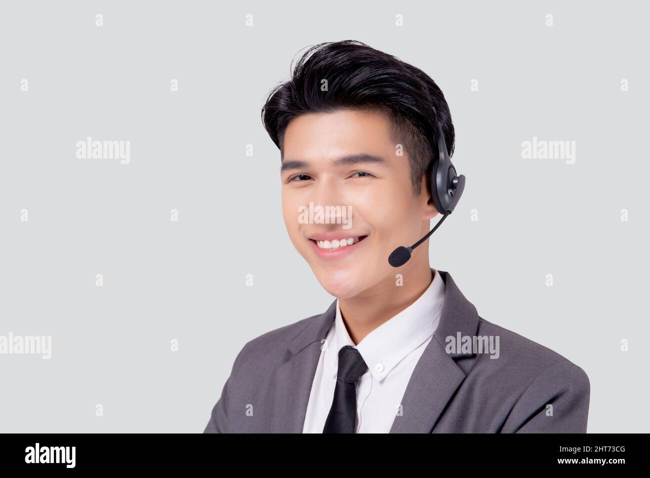 Portrait young asian business man call center wearing headset isolated ...