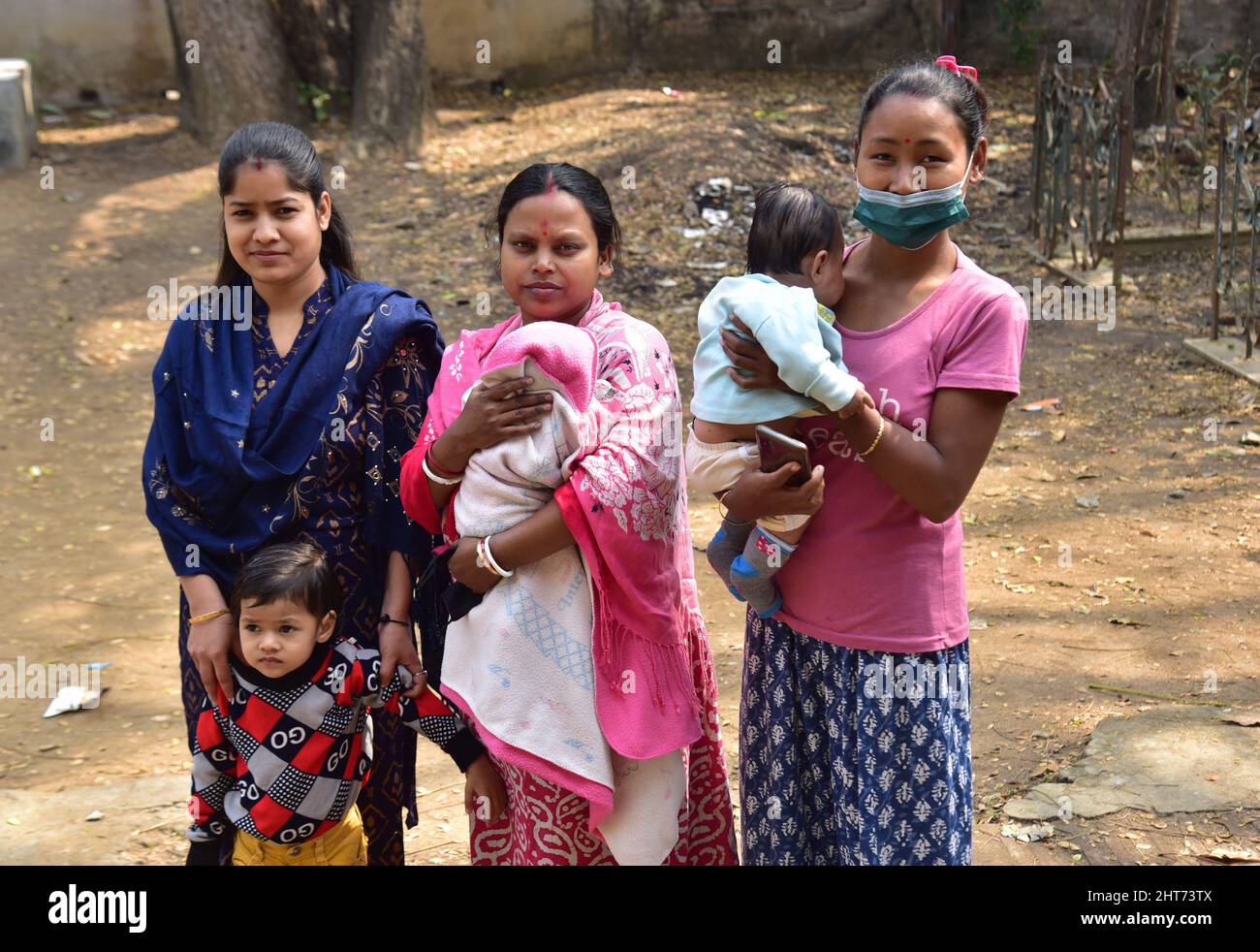 Guwahati, Guwahati, India. 27th Feb, 2022. Women bring their children ...