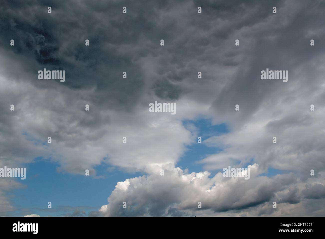 Texture of a gray sky. Dramatic gray clouds, moody day Stock Photo - Alamy