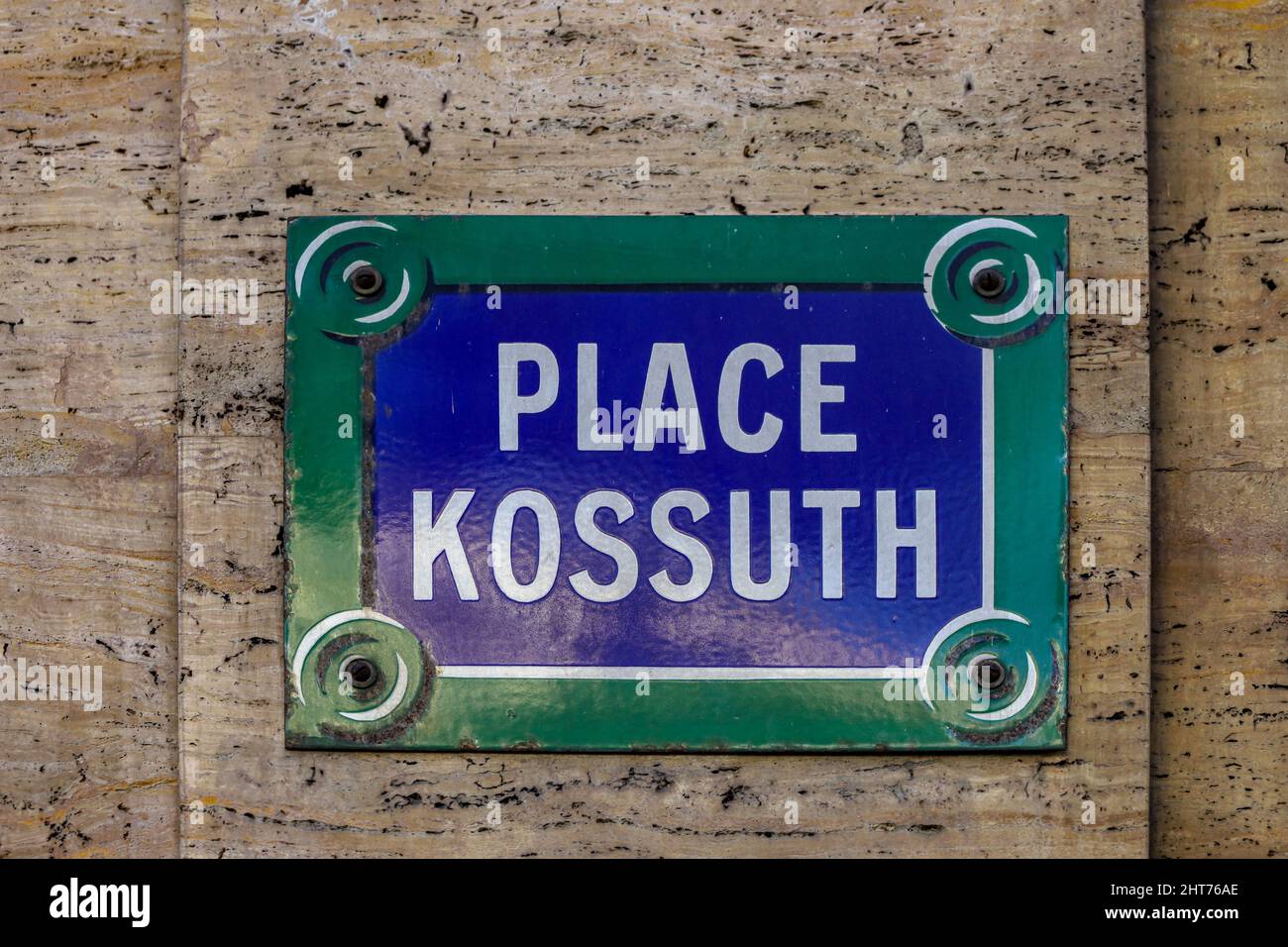 Photo of a typical street name plate on a building facade in Paris ...