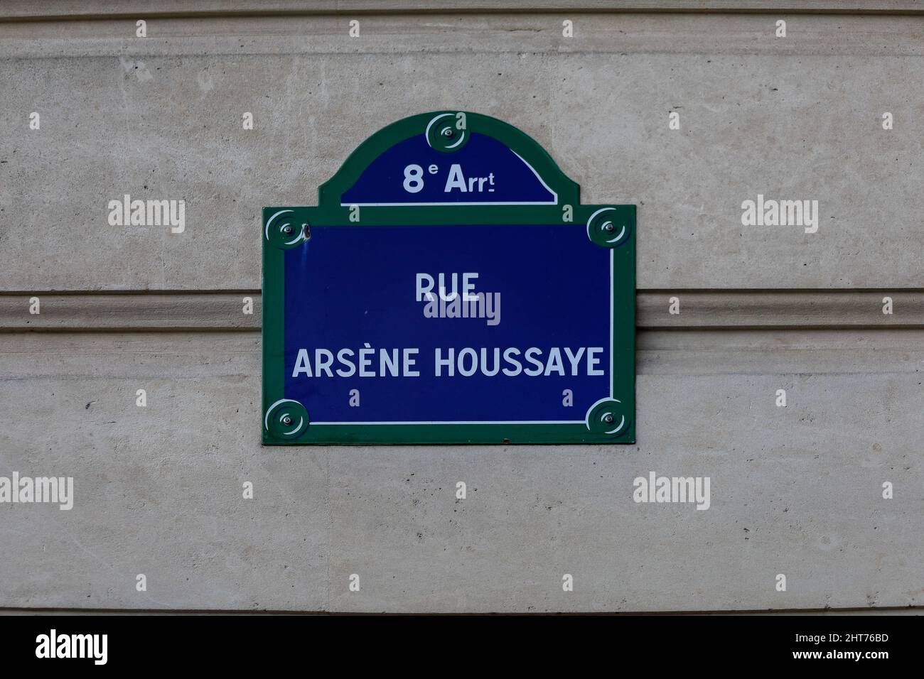 Photo of a typical street name plate on a building facade in Paris ...