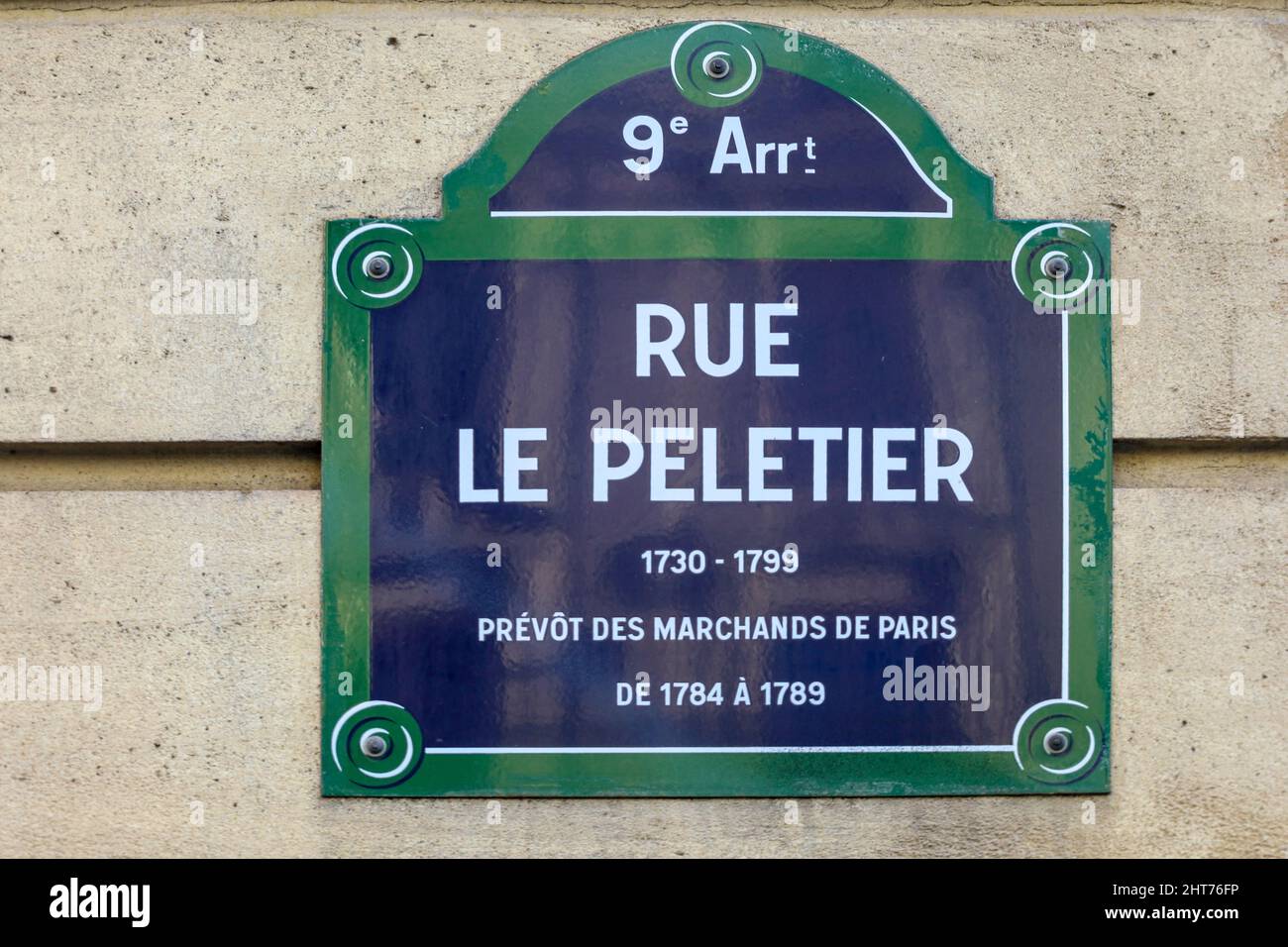 Photo of a typical street name plate on a building facade in Paris ...