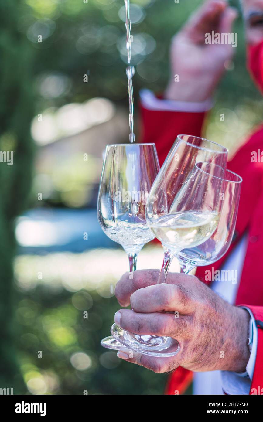 Mans hand pouring alcohol hi-res stock photography and images - Alamy