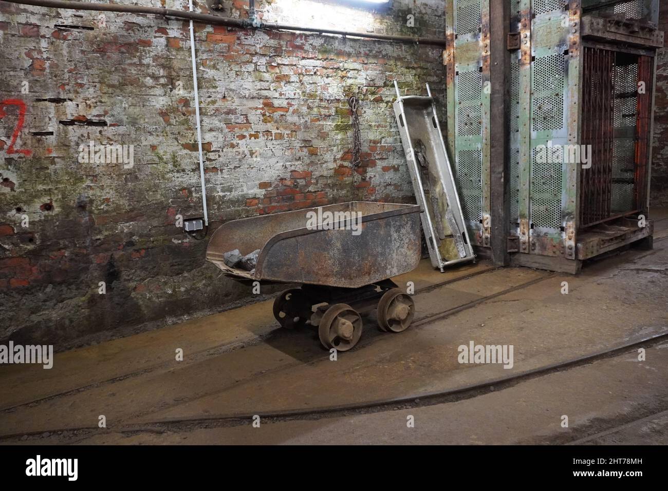 Old abandoned factory with a rusty cart Stock Photo - Alamy
