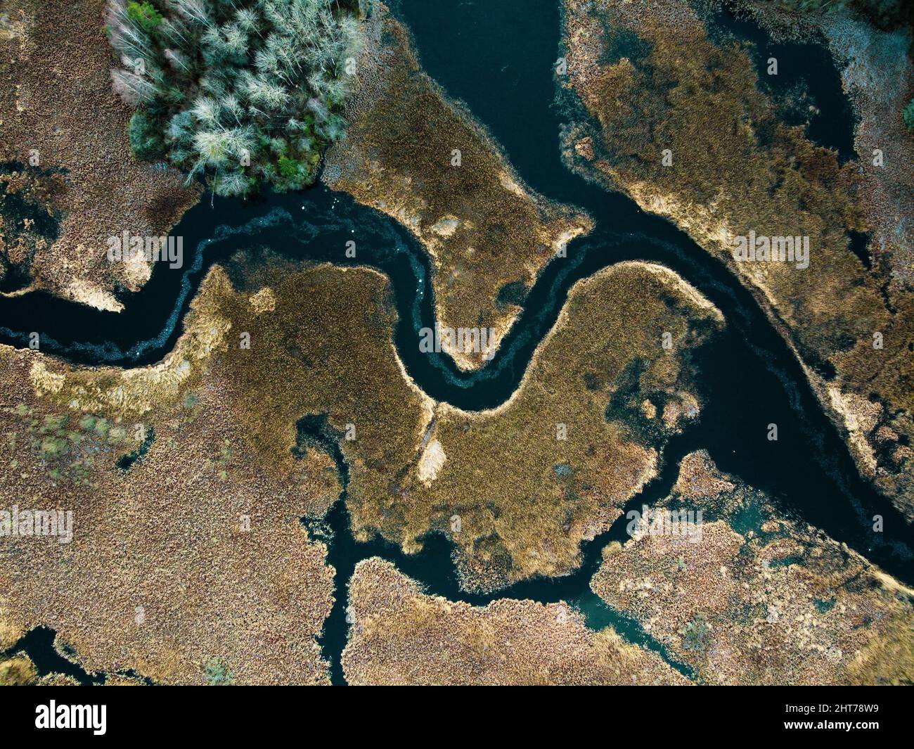 Aerial view of a river and a field Stock Photo - Alamy