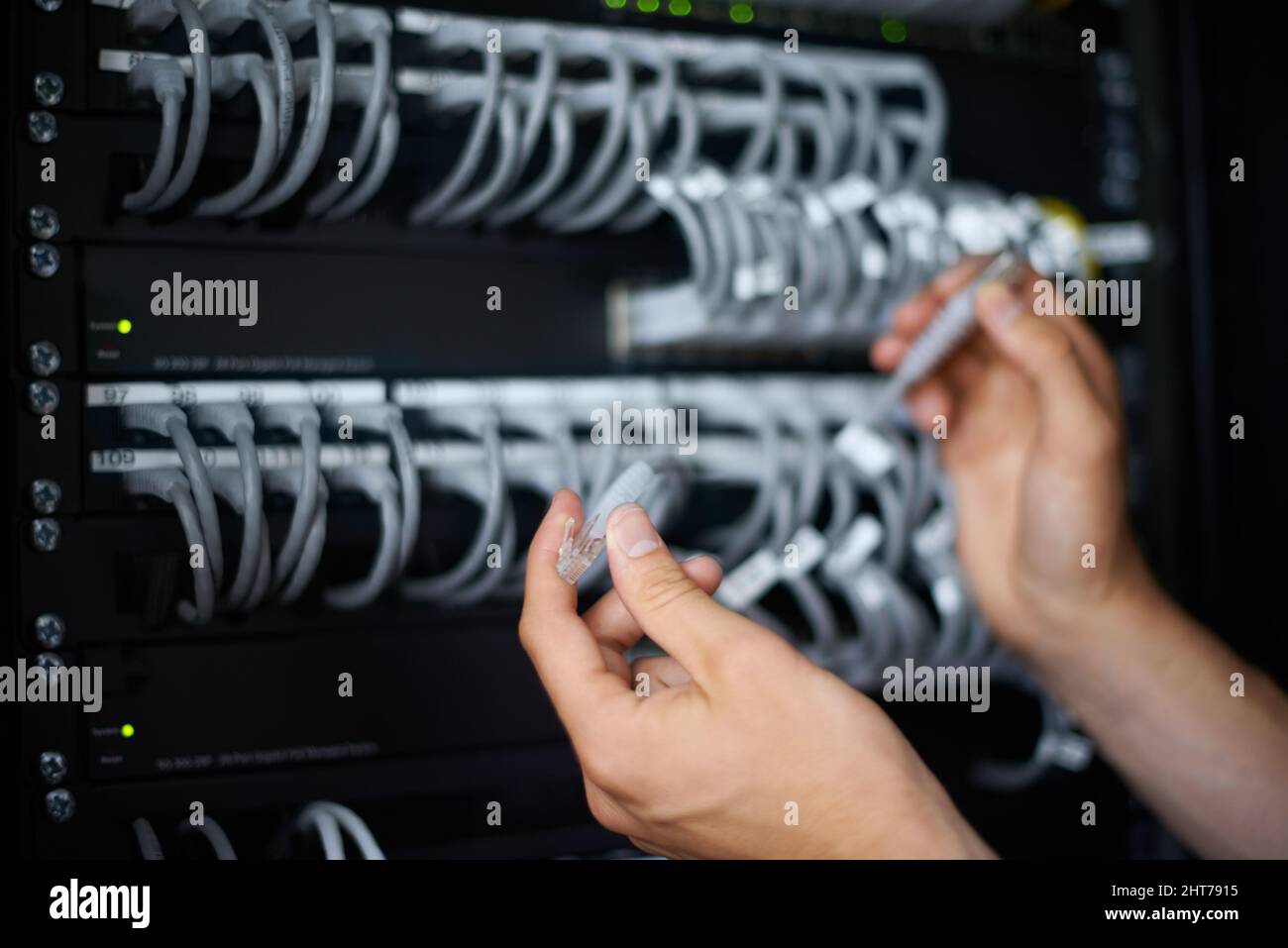 Man holding computer cables hi-res stock photography and images - Alamy