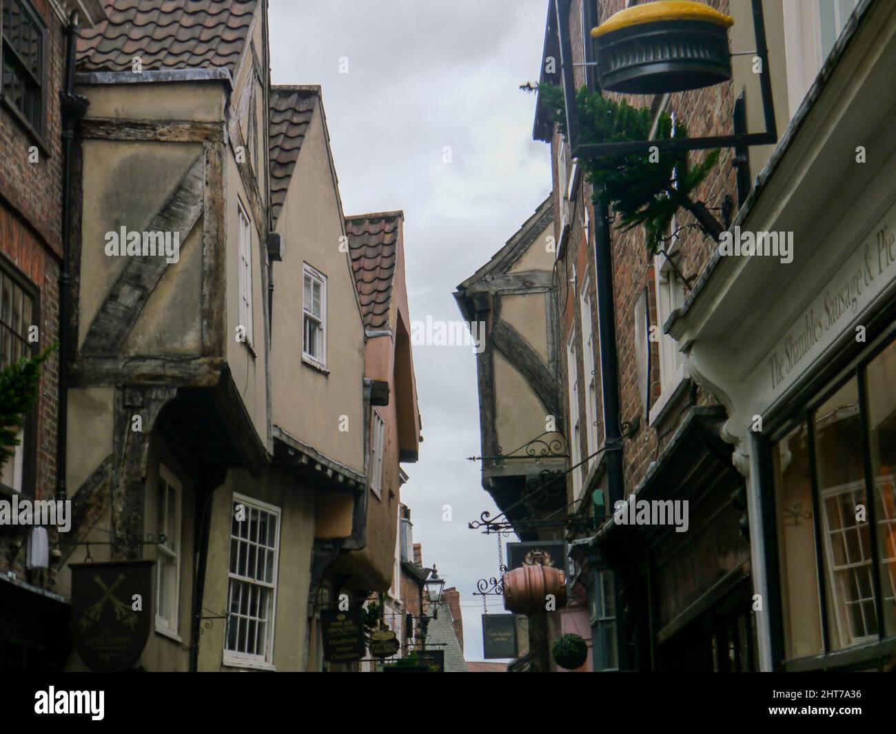 Medieval buildings lean towards each other in the shambles, York ...