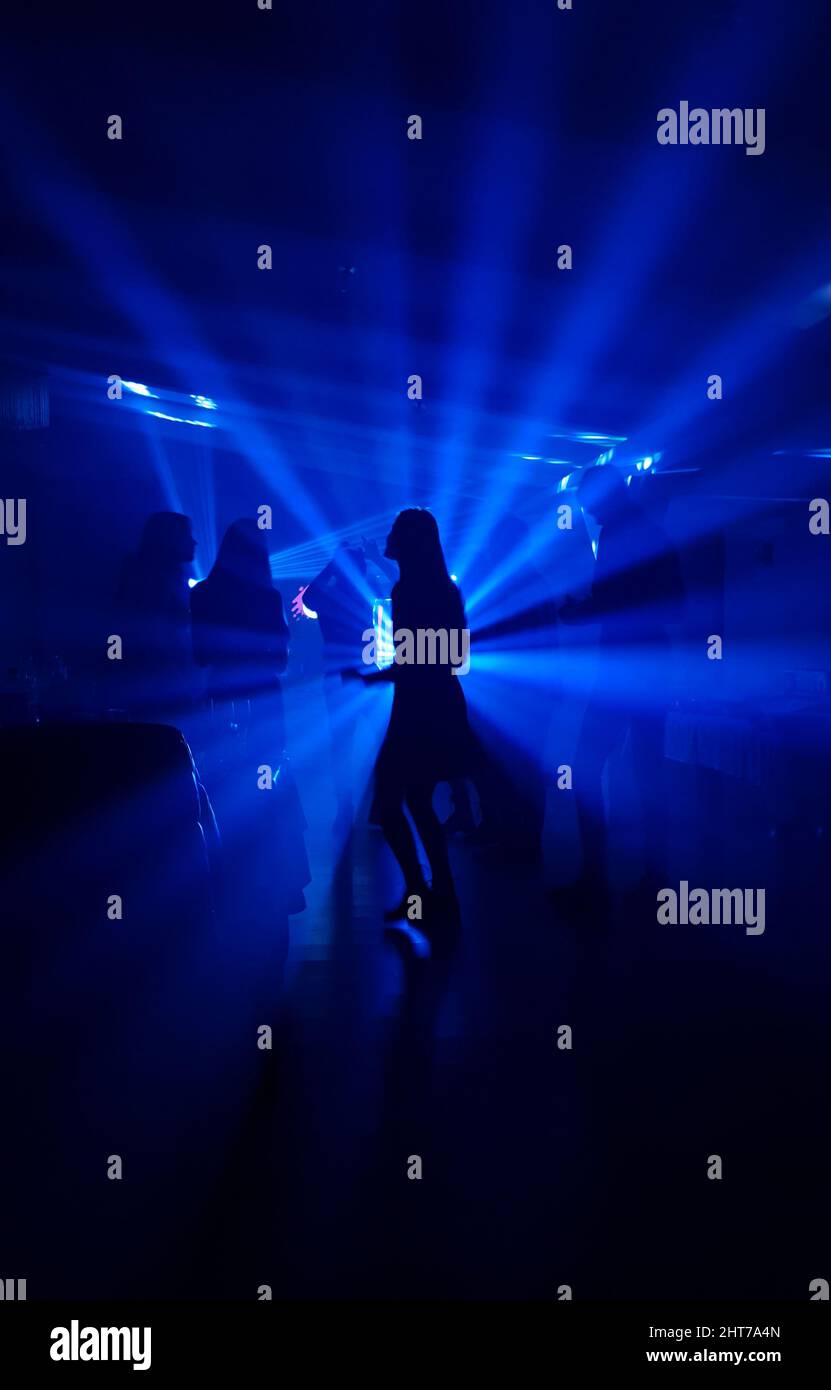 Vertical shot of young people dancing in the club Stock Photo - Alamy