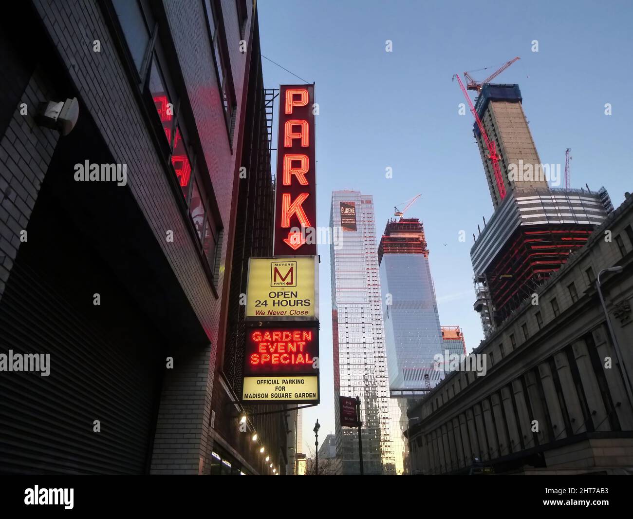 Low angle shot of a Madison Square Garden red neon parking sign with ...