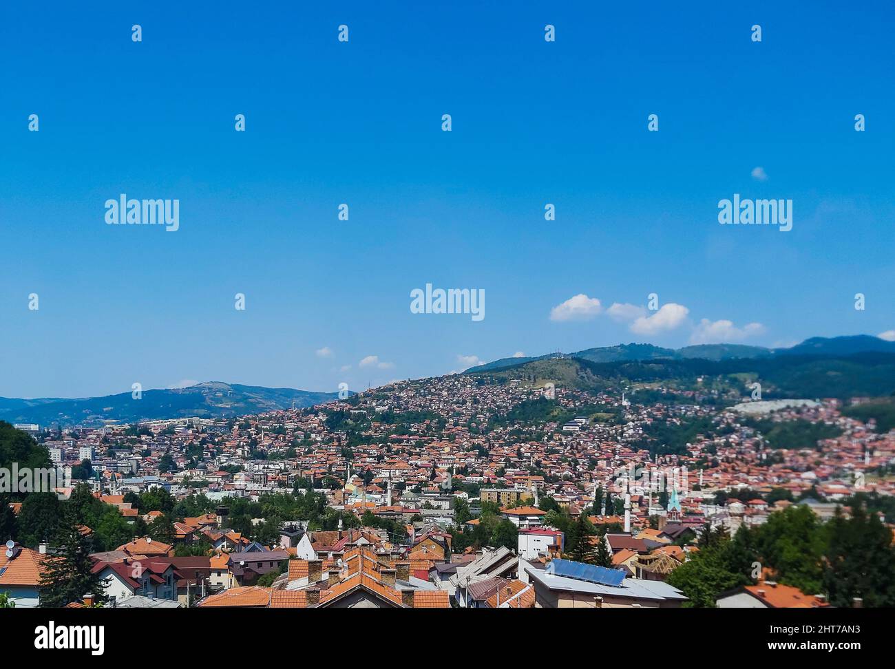 Top view of a city with blue sky in the background Stock Photo - Alamy