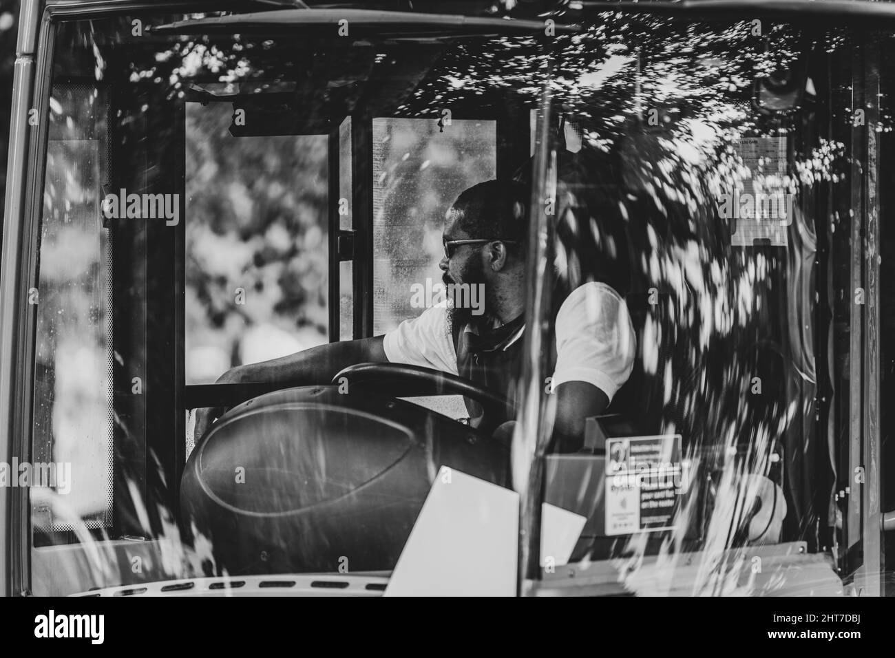 Driving a bus Black and White Stock Photos & Images - Alamy