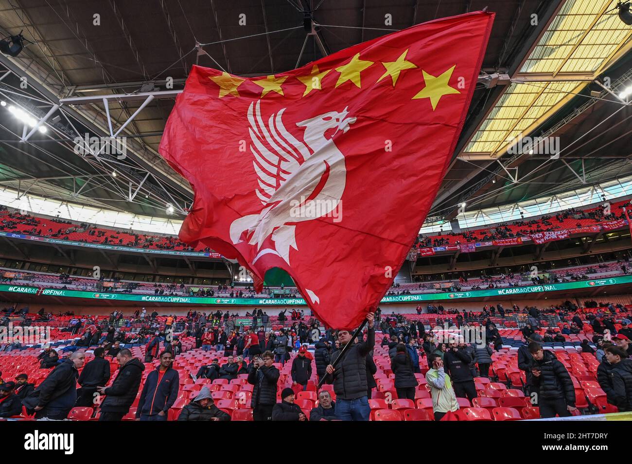 Liverpool fan waves a giant flag Stock Photo - Alamy