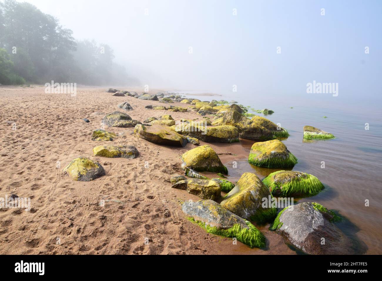 Fog sky over the sea captured from the sandy beach in autumn Stock ...