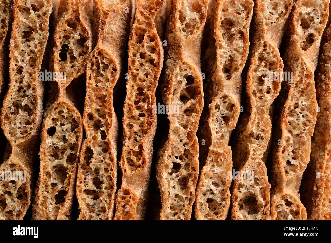 Crispy rye bread. Slices background Stock Photo - Alamy