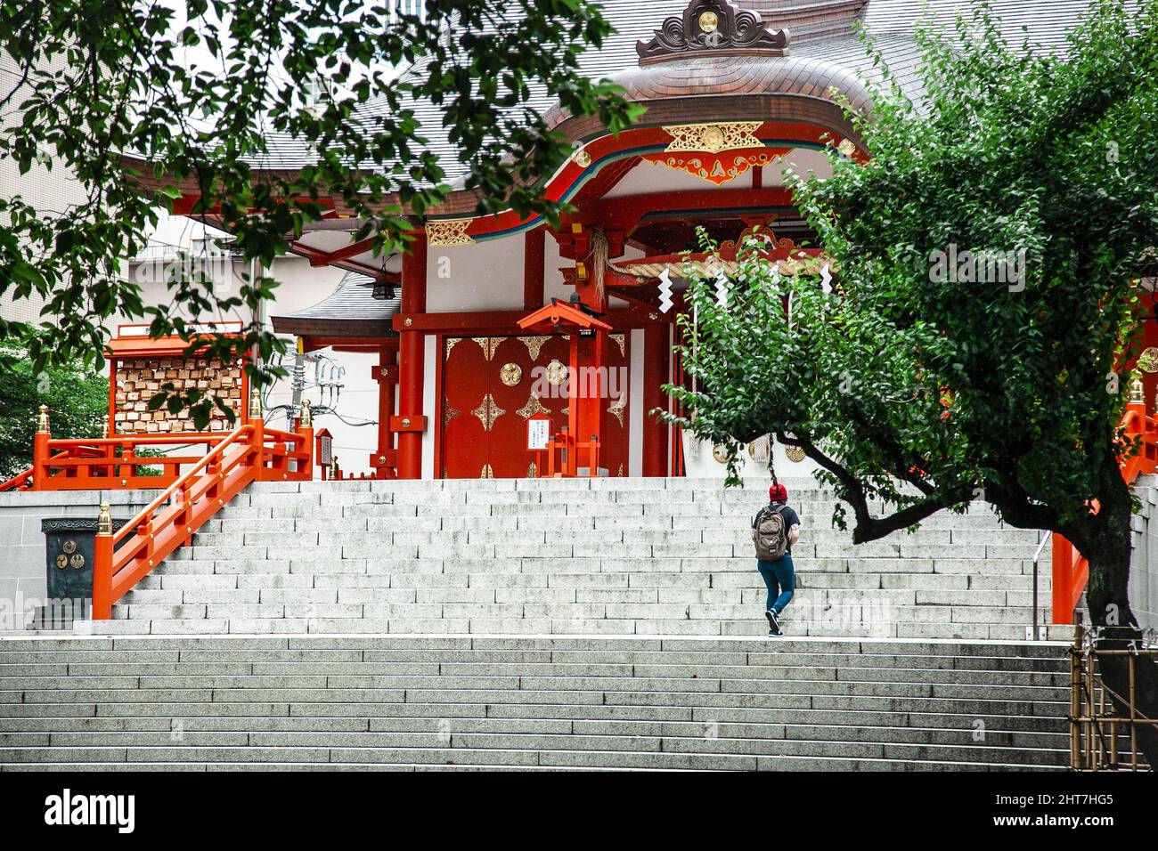 Tourist walking up stairs of building in Tokyo, Japan Stock Photo - Alamy