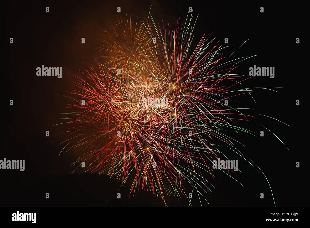 Colorful fireworks bursting low hi-res stock photography and images - Alamy