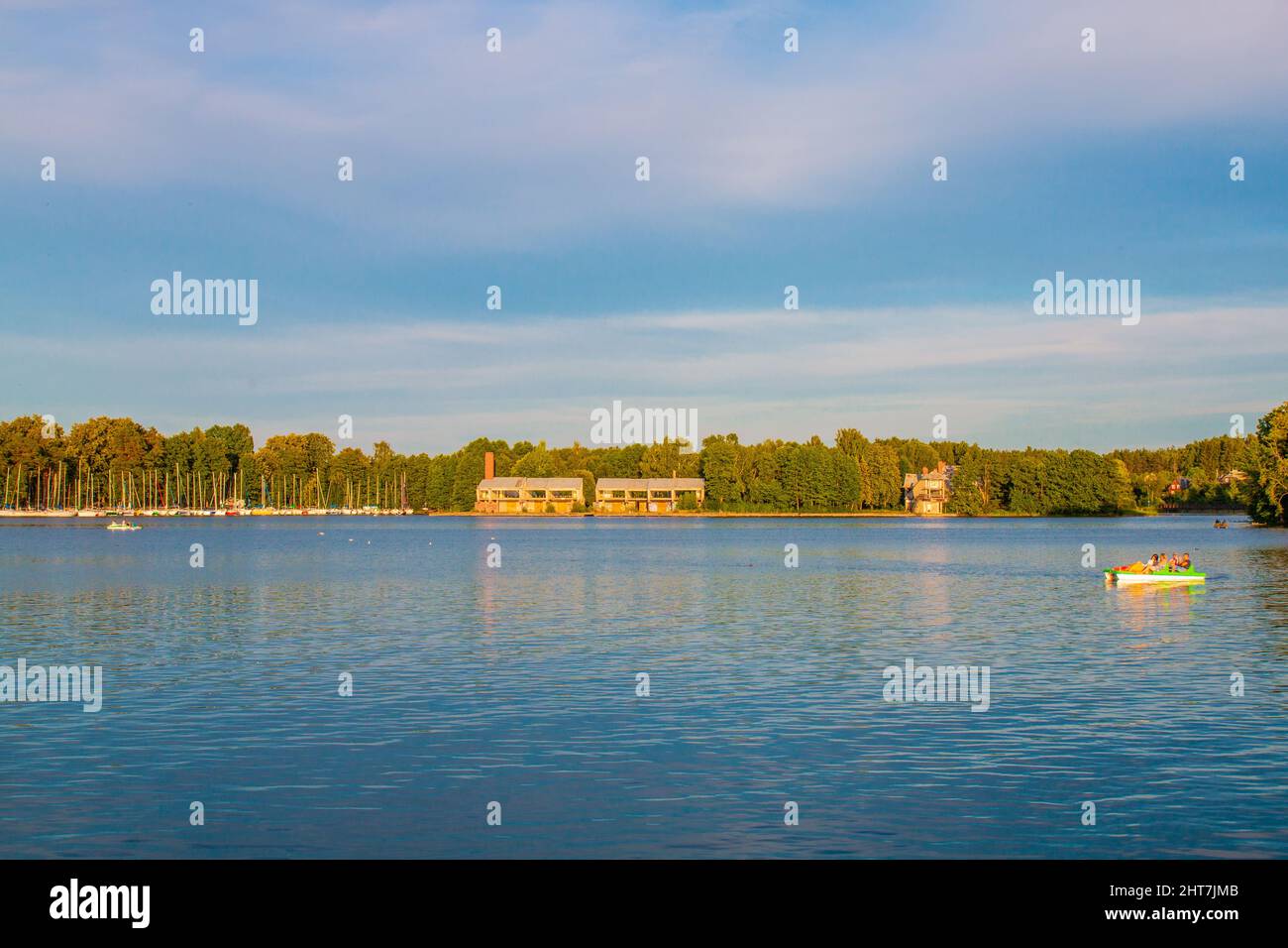 Beautiful view of the lake surrounded by trees and the ancient ...