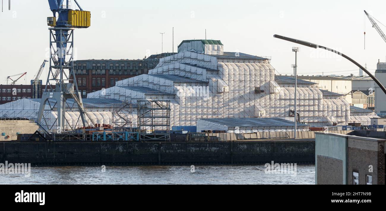 Hamburg, Germany. 27th Feb, 2022. Completely shrouded, the mega-yacht ...