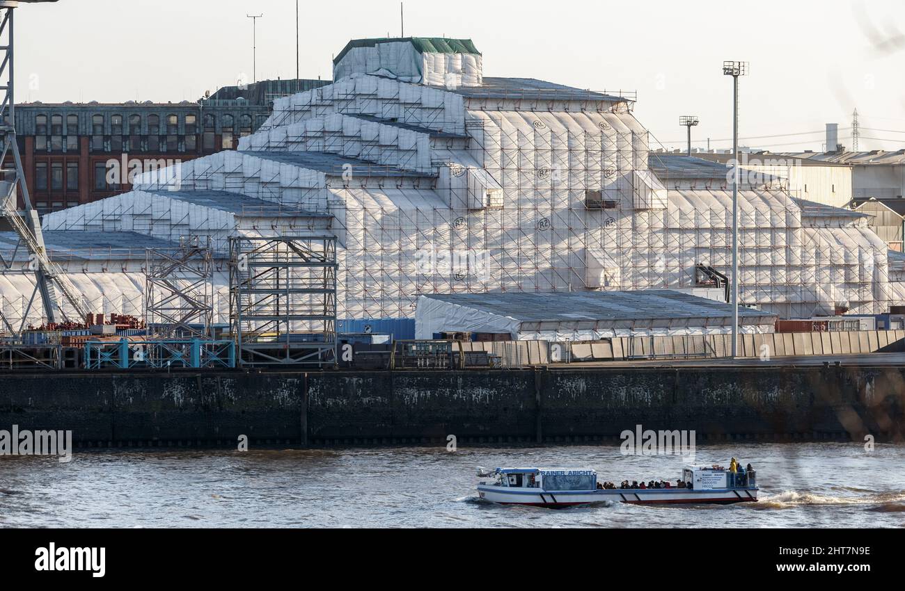 Hamburg, Germany. 27th Feb, 2022. Completely shrouded, the mega-yacht ...