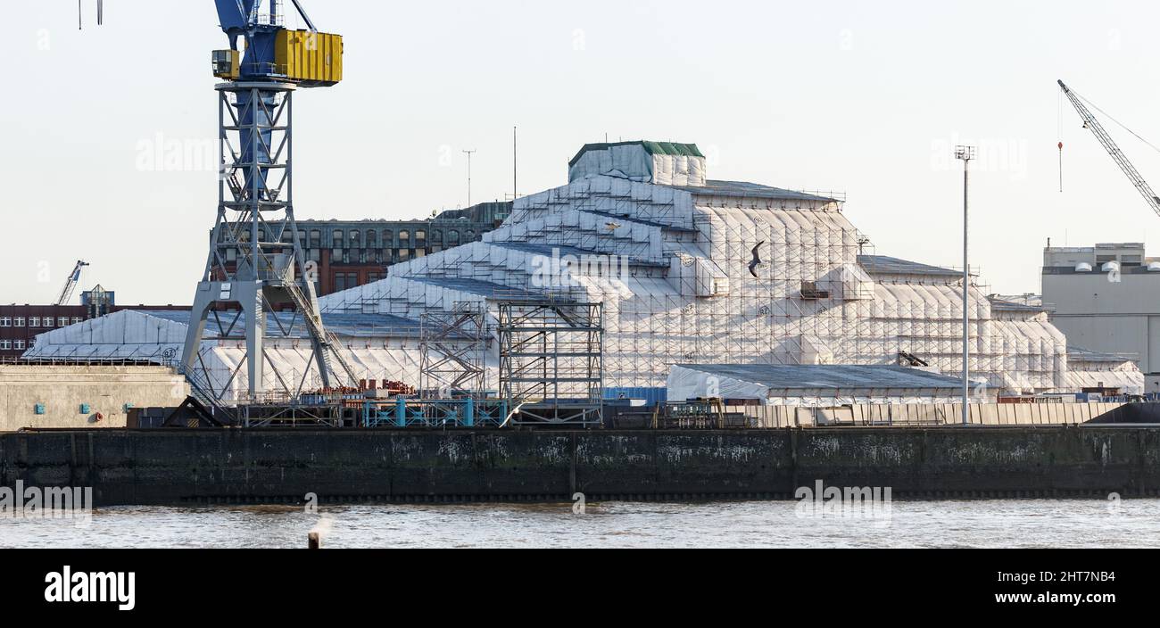Hamburg, Germany. 27th Feb, 2022. Completely shrouded, the mega-yacht ...