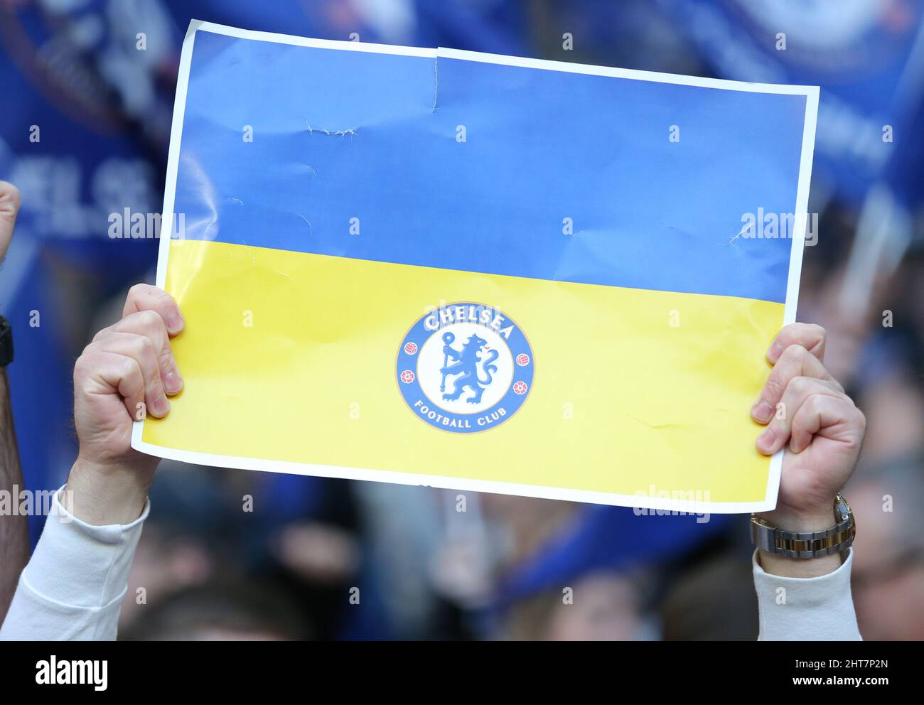 CHELSEA FAN HOLDS UP A PICTURE OF THE UKRAINE FLAG IN SUPPORT, CHELSEA ...